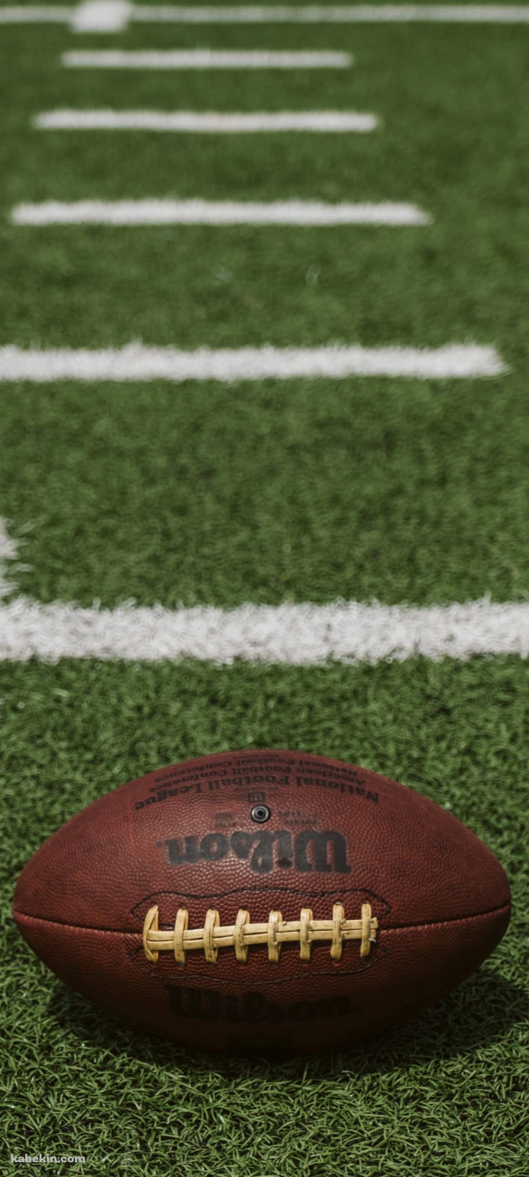 Wilson アメフトのボールのAndroid用のスマホ壁紙(1080 x 2400)| 壁紙キングダム